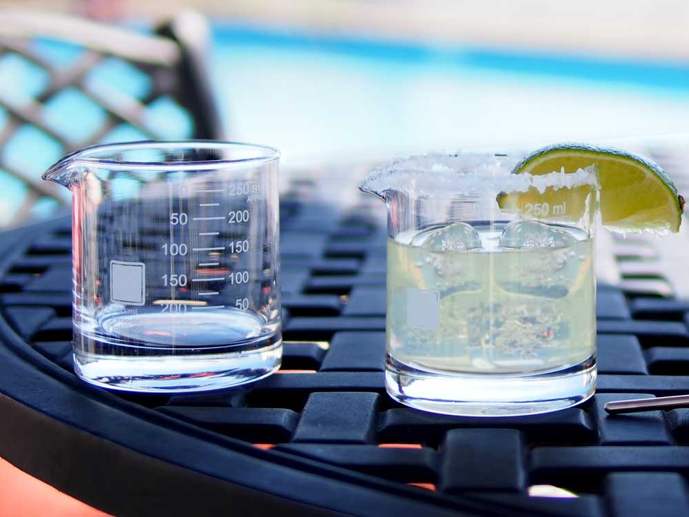 Capturing the reaction between laboratory glass and drinkware.